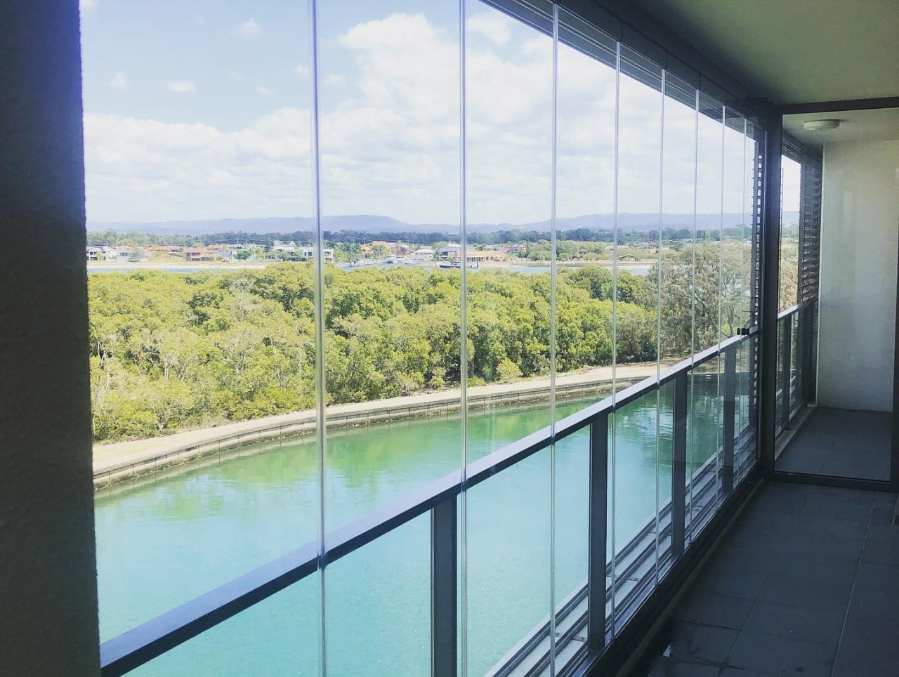 Balcony Enclosures | Frameless Glass Doors | StackPro - CLEAR EDGE GLASS